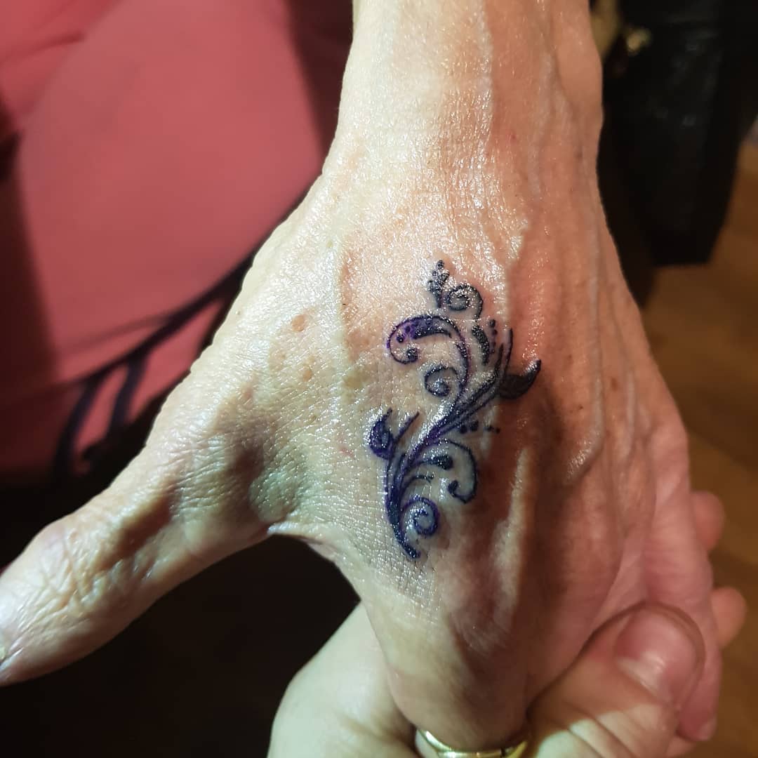 20 Best Tattoos Designs For Older Women